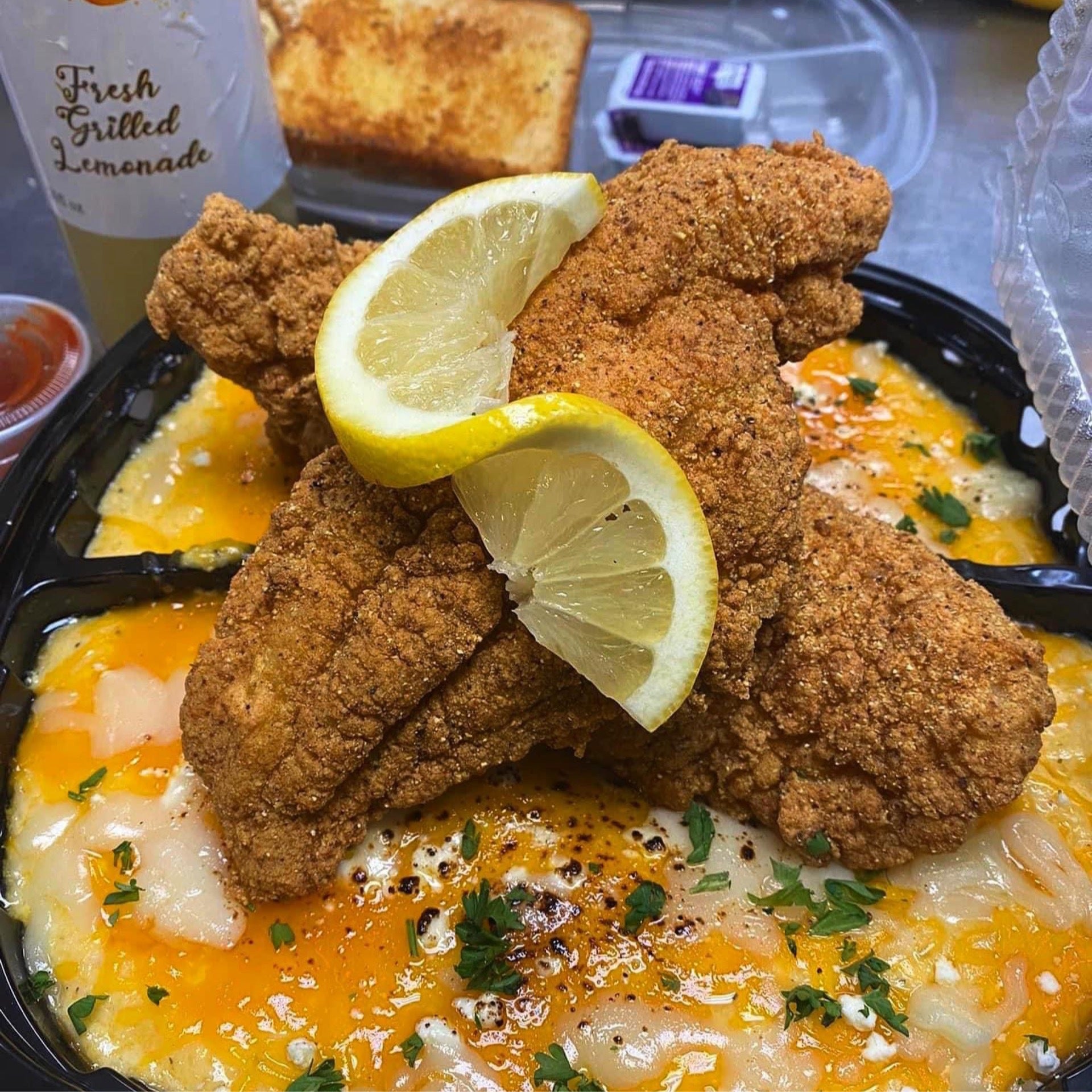 Double Catfish and Orange Grits | Lob-House Seafood and Steak Luxury ...